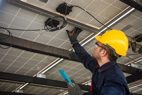 Engineer Technical Service Checking Solar Panel While Monitoring The