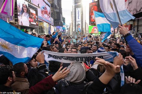 Cheering Crowds Of Exhilarated Soccer Fans In Nyc Flood Times Square