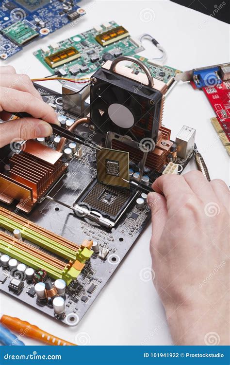 Technician Plug In Microprocessor To Motherboard Stock Photo Image Of Fixing Microchip