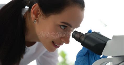 Pharmacy Scientist Working With Professional Microscope In Technology