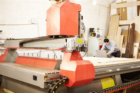 Cnc Machine At Carpentry Workshop Cutting Wood With Various Router Bits Stock Image Image Of