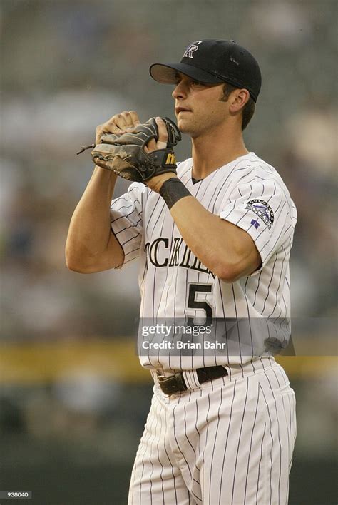 Second Baseman Brent Butler Of The Colorado Rockies Flexes His Glove