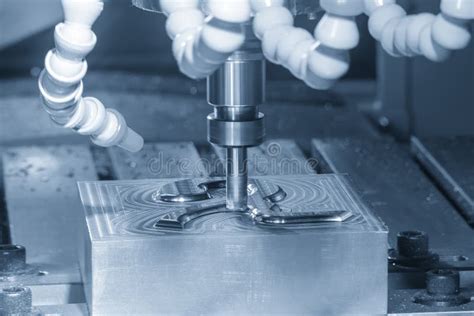 The Cnc Milling Machine Rough Cutting The Injection Mold Parts By Indexable Tools In The Light