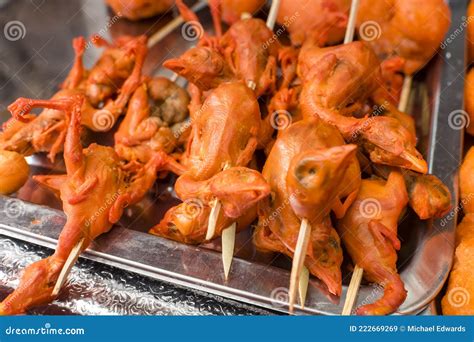 Skewered Deep Fried One Day Old Chicks An Exotic Filipino Street Food