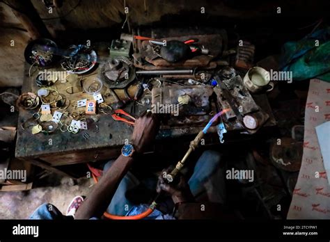 Samwel Mwangi Makes Jewelries At His Shop In Kibera Slum On October 25 2023 In Nairobi Kenya
