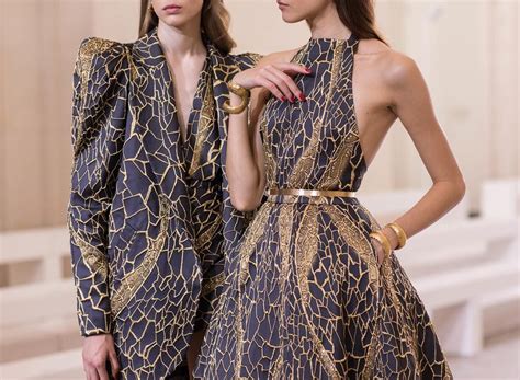 Organic Patterns Flow From Structured Jackets To Floor Length Gowns