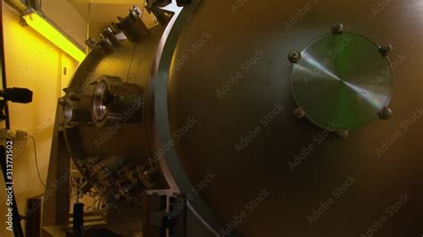 hands open a cyclotron particle accelerator technology for atoms