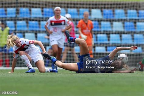 Arin Gilliland Wright Of The Newcastle Jets Is Upended In A Tackle News Photo Getty Images