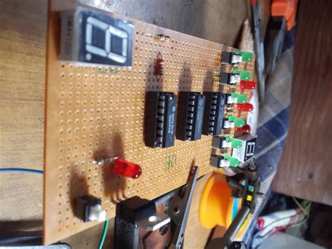Voting System By Using 4 Bits Parallel Adder Trybotics