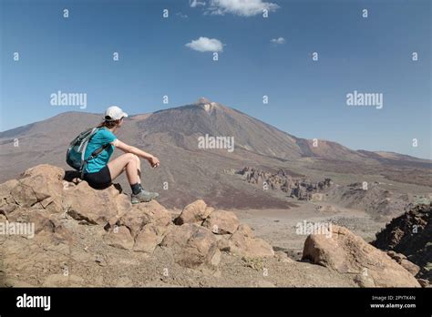 Tourist Girl Next To Peak Of Mount Teide Called Pico Del Teide View