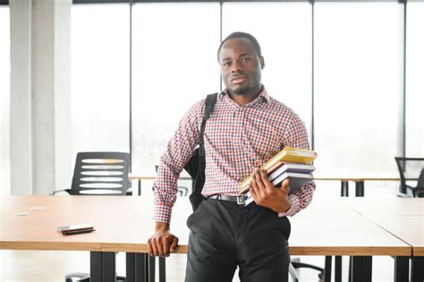 Portrait Of African University Student In Class Looking At Camera Stock