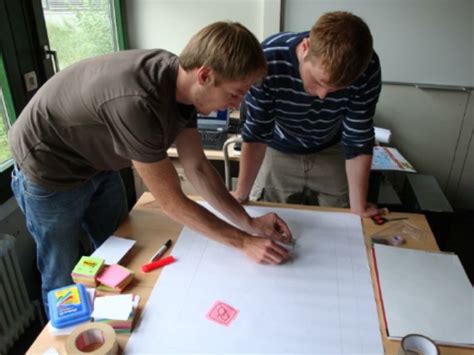 Interacting With Physical Artifacts During Collaborative Ideation