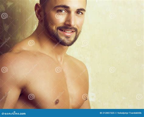 Happy Handsome Man Muscular Athlete Or Strong Guy Smiling With Stylish