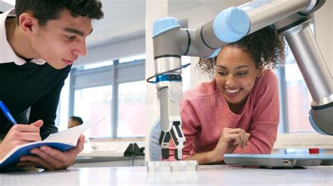 Male And Female College Or University Engineering Students In Robotics