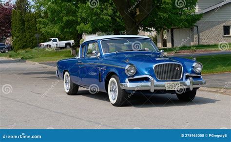Royal Blue Studebaker Golden Hawk On Street In Canada Editorial Stock