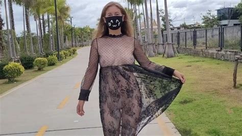 Lustful Girl In A Transparent Dress In A Public Park