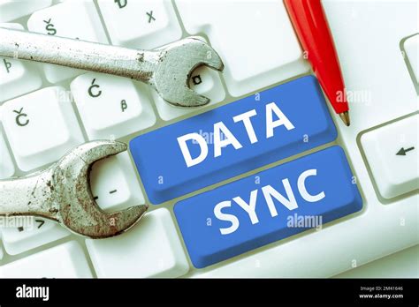 Sign Displaying Data Sync Business Overview Data That Is Continuously