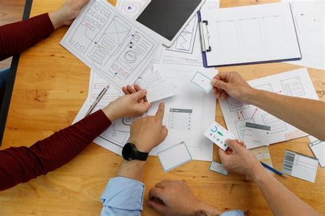 Premium Photo Graphic Designers Work Together With Ux Ui Designer Planning Application