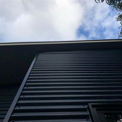 Colorbond Deep Ocean Cladding And Weathergroove Natural Timber Cladding Colorbondsteel