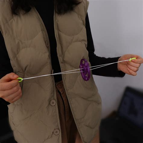 مضيئة اليد سحب وامض حبل دولاب الموازنة لعبة Led ضوء الجدة الأطفال دولاب