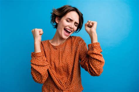 Photo Of Excited Lady Raise Hands Fists Completed Hard Level Mobile App