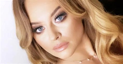 Emily Atack sends pulses racing in skimpy black negligée for eye popping display Daily Star