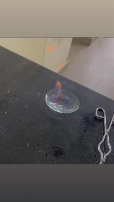 Test For Ethanol — Lighted Splint Burns With Blue Yellow Flame
