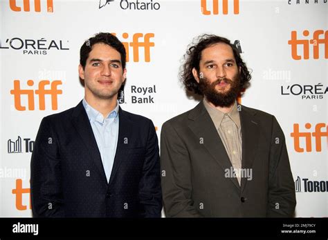 Directors Benny Safdie Left And Josh Safdie Attend A Premiere For