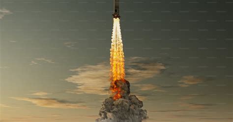 로켓이 물 위의 하늘을 날고 있습니다 사진 Unsplash의 로켓 이미지