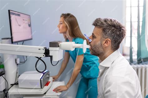Premium Photo Man Performing Pulmonary Function Test And Spirometry