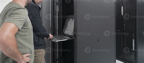 Technicians Team Updating Hardware Inspecting System Performance In