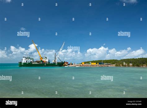 A Cargo Ship Unloads Cargo At The Port Horn Island Torres Strait