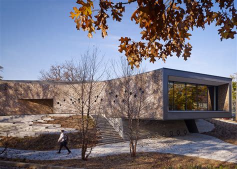 Timber Disks Cover The Facades Of Studio Gangs Woodland Campus