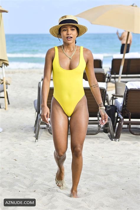 Karrueche Tran Sexy Curves In A Bright Yellow Swimsuit During Beach Day