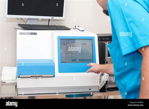 Embryologist Or Lab Technician Working With Human Egg Under The Microscope Doctor Adding Sperm