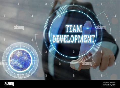 conceptual hand writing showing team development concept meaning learn