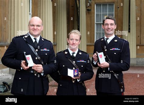 Royal Marine Major Ewen Murchison L Receives His Mbe With Lt Col