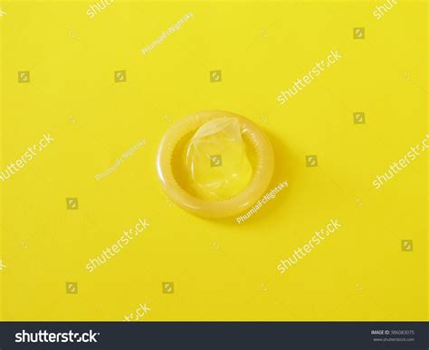 Sex Concept Condom On Yellow Background Stock Photo Shutterstock