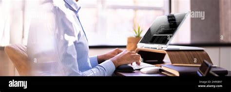 African American Coder Using Computer At Desk Web Developer Stock