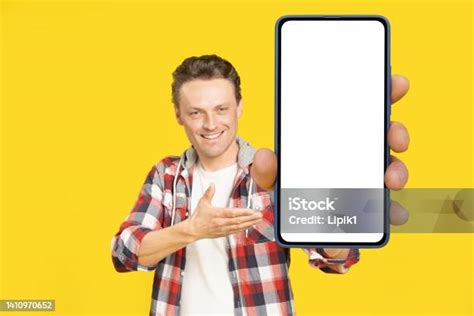 Introducing New App Happy Holding Giant Huge Smartphone With White