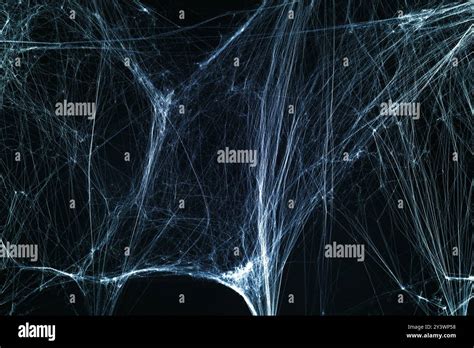 Cobweb Against Black Background Toned In Gradient Blue Color Stock