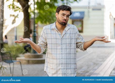 Confused Indian Man Feeling Embarrassed About Ambiguous Question