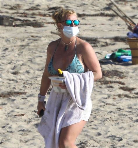 Britney Spears Sunbathing On The Beach In Malibu With Her Security