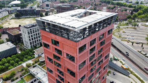 Rooftop System With Pv Panels Mini Wind Turbines In The Netherlands