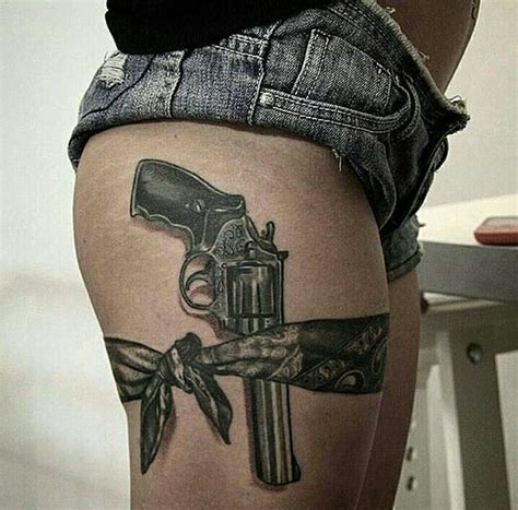 Photo Gun Hip Tattoo