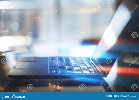 Close Up Of Laptop Computer With Abstract Binary Code On Blurry