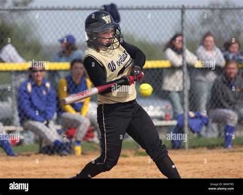Softball Players Batting