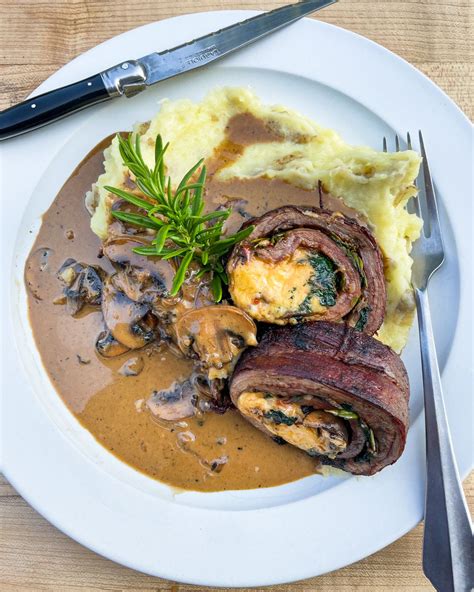 Gourmet Stuffed Flank Steak With Mushroom Cream Sauce