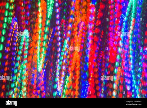 Abstract Pattern Of Beads As Colorful Lights In Vertical Zig Zag Motion
