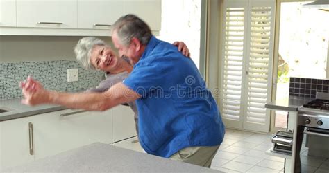 Couple Dancing Man And Woman Take Off Their Clothes Then Kiss Legs